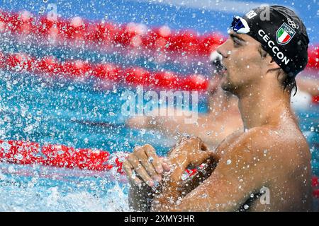 Thomas Ceccon of Italy celebrates after winning the gold medal in the ...
