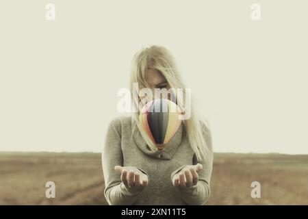 Adventure and traveling concept with hands holding a world GO written ...