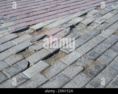 Cracked dangerous paving pavement path health and safety. Broken ...