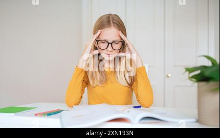 struggling teen girl studying at home Stock Photo - Alamy