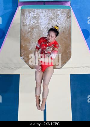 Huan Luo of China competes in the Balance Beam during Women's Team ...