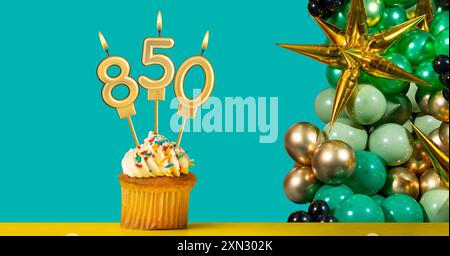 Birthday candle number 850 - Cupcake and balloon decoration Stock Photo ...
