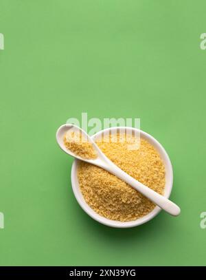 Yellow japanese panko crumbs in the spoon and bowl Stock Photo - Alamy