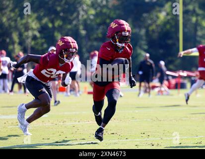 Washington Commanders cornerback Mike Sainristil (0) celebrates the ...