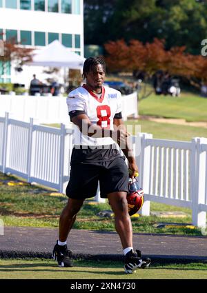 Washington Commanders running back Brian Robinson Jr. (8) runs with the ...