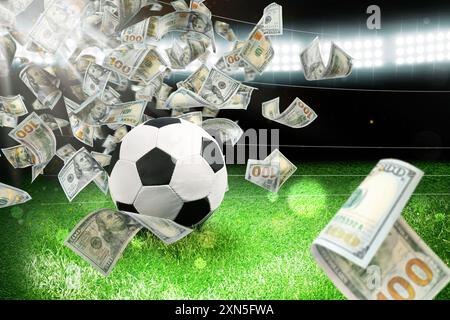 Money flying from soccer ball on stadium Stock Photo - Alamy