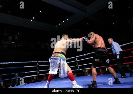 Junlong "The Dragon King" Zhang, in red and white gloves, faces Cesar ...
