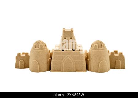 Sandcastle sculpture featuring various towers on a white background ...