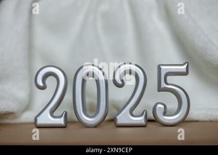 Holiday neutral card with number 2025 Stock Photo - Alamy