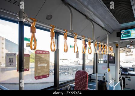 Inside a modernized Metro bus with updated interior features during ...