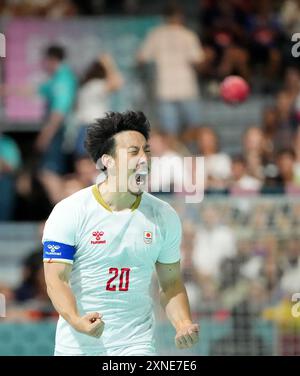Jin Watanabe, of Japan, reacts during a men's handball match against Sweden at the 2024 Summer ...