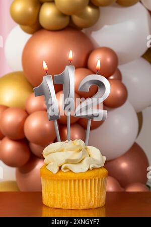 Birthday candle number 112 - Birthday celebration on black background ...