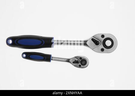 Two torque wrenches on white background, top view. Auto mechanic tools ...