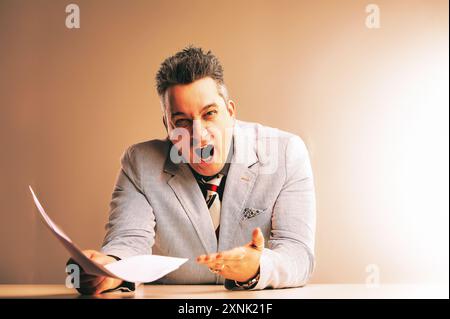 Work Burnout. Portrait Of Upset Mature Businessman Sitting At Desk In ...