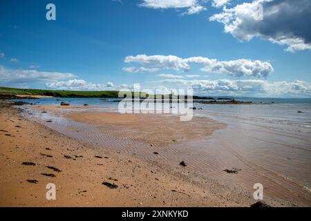 Elie lighthouse in the distance across Ruby bay at Elie Fife Scotland ...