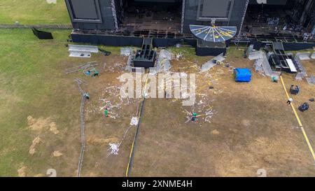 Drone photography of volunteers cleaning up trash and people ...