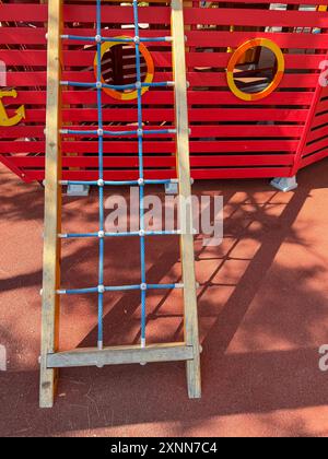 childrens rope ladder on playground Stock Photo - Alamy