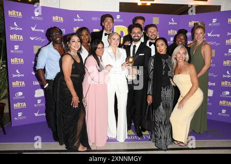 The Apprentice cast pose in the winners area at the National Reality TV ...