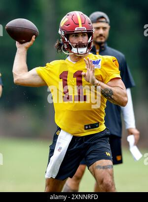Washington Commanders quarterback Sam Hartman (15) in action during the ...
