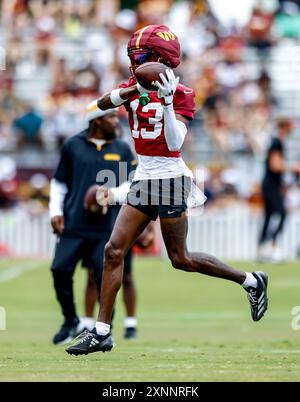 Washington Commanders Cornerback Emmanuel Forbes (13) greets fans as he ...