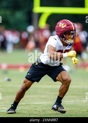 Washington Commanders running back Austin Ekeler (30) warms up against ...