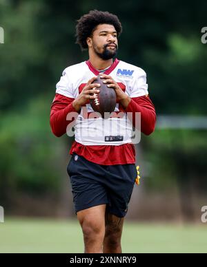 Washington Commanders tight end Armani Rogers (88) runs during an NFL ...
