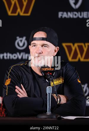 Washington Commanders head coach Dan Quinn speaks during an NFL ...