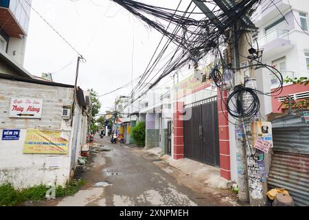 Back alley in the outskirts of HCM city in Vietnam Stock Photo - Alamy