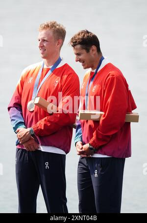 Switzerland's men's pair rowing bronze medalists Andrin Gulich, right ...