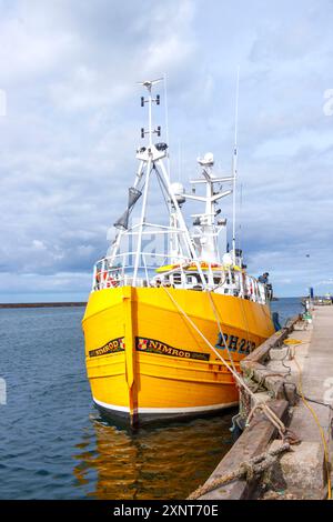 fishing boats and trawlers amble harbour Amble Northumberland UK Stock ...