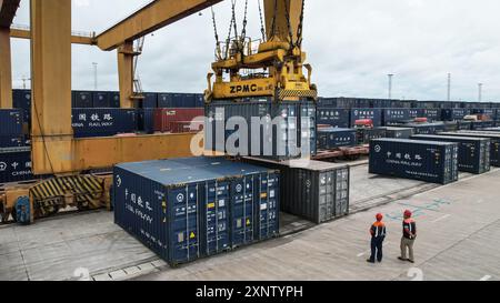 (240802) -- NANNING, Aug. 2, 2024 (Xinhua) -- A train runs on the ...