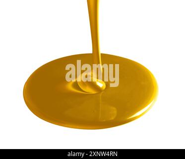 Pouring gold fluid on white background. Bright liquid Stock Photo - Alamy
