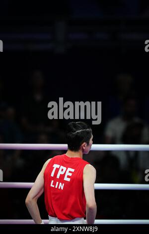 Chinese Taipei's Lin Yu Ting (left) celebrates following victory ...