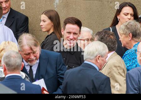 BBC Radio Ulster presenter Connor Phillips (centre left) at Trinity ...