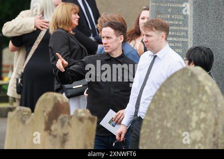 BBC Radio Ulster presenter Connor Phillips (centre) at Trinity ...