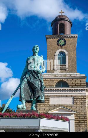 A vertical low angle shot of a building with an ancient exterior design ...