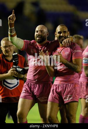 Hull KR's Sam Luckley (left) leaves the pitch with an injury during the ...