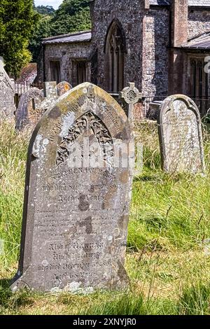 Aldbourne / England - June 25, 2024: Ancient, weathered stone grave ...