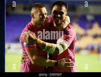 Hull KR's James Batchelor (left) celebrates scoring a try during the ...