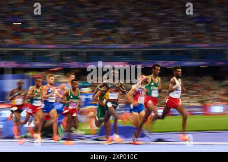 Athletes compete in the men's 10000 meters final at the World Athletics ...
