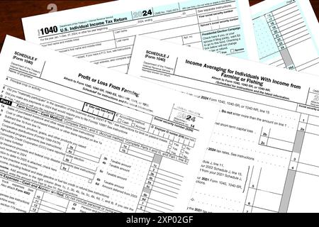 2024 IRS tax forms lay on a desktop Stock Photo - Alamy