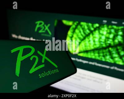 Cellphone with logo of Finnish hydrogen company P2X Solutions Oy on ...