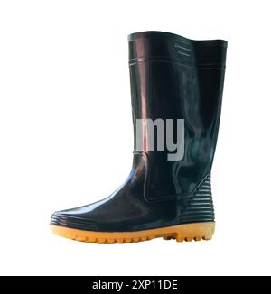 Side view of one side of black gumboots or rubber boots is isolated on ...