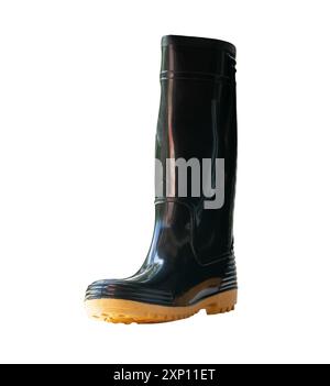 Side view of one side of black gumboots or rubber boots is isolated on ...