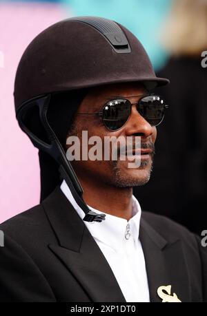 Snoop Dogg watching the Dressage Team Grand Prix Special at the Chateau ...