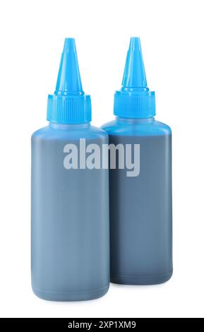 Bottles of light blue printer ink isolated on white Stock Photo - Alamy