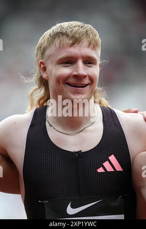 Zak Skinner after winning the Men's 100m Ambulant final, with Thomas ...