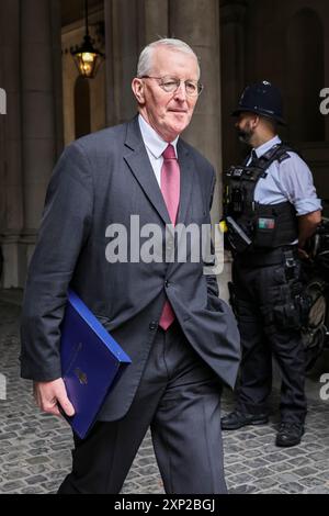 Northern Ireland Secretary Hilary Benn leaves following a Cabinet ...