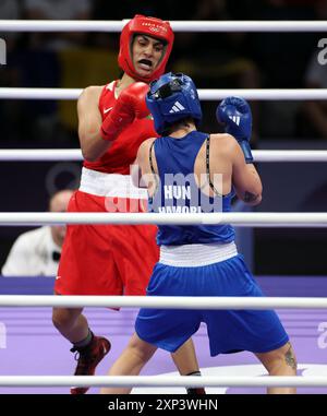 Algeria's Imane Khelif (left) and Hungary's Luca Anna Hamori during the ...