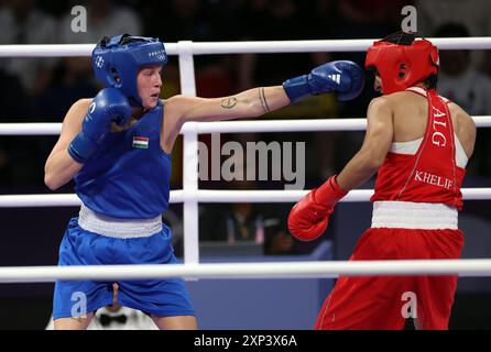 Algeria's Imane Khelif (right) and Hungary's Luca Anna Hamori during ...